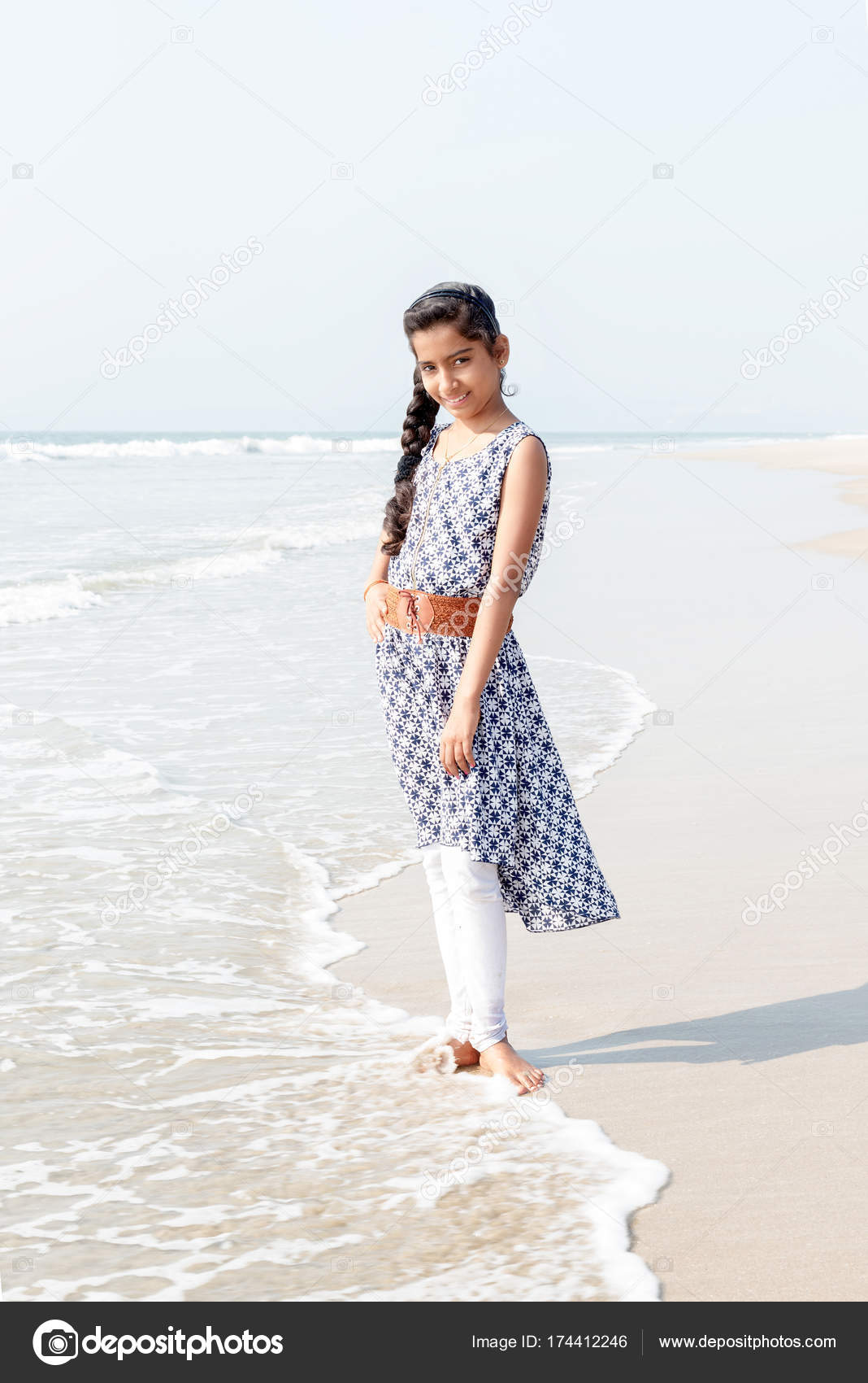 Beautiful indian teenage female on the beach in sunlight. — Stock Photo ... Beautiful indian teenage female on the beach in sunlight. — Stock Photo ...