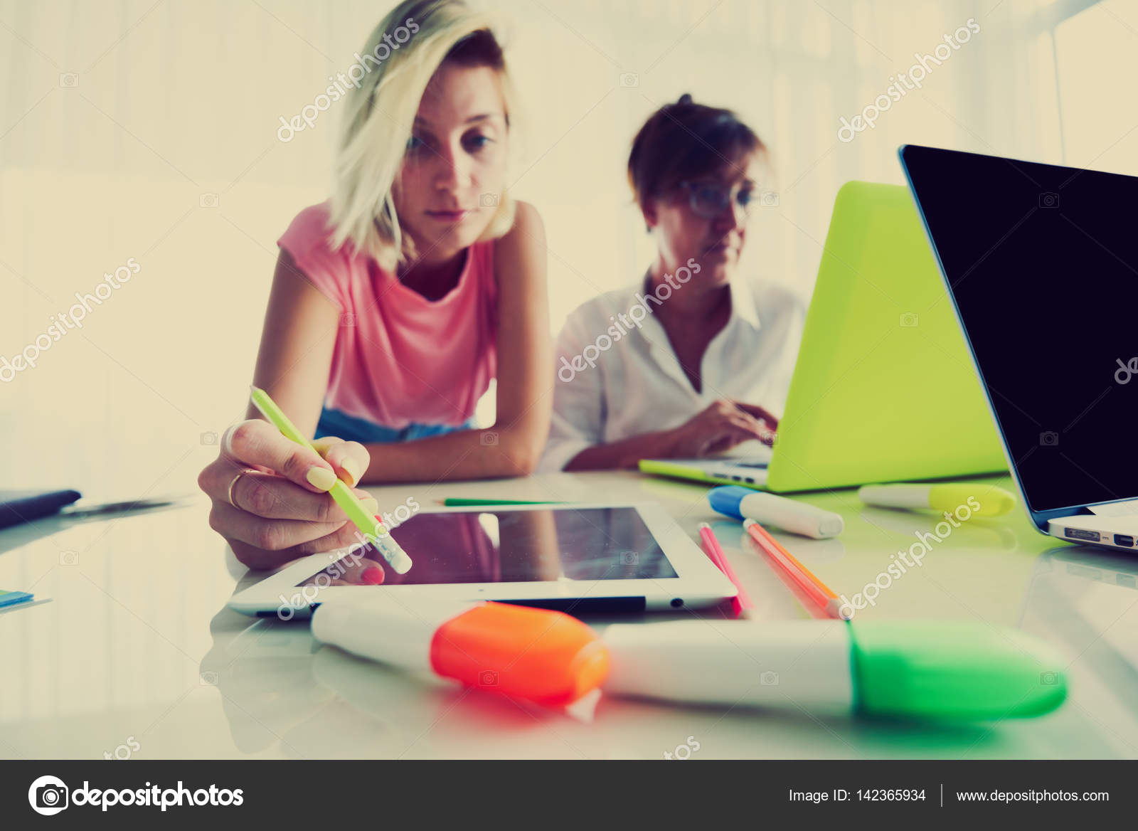 Women using gadgets Stock Photo by ©GaudiLab 142365934