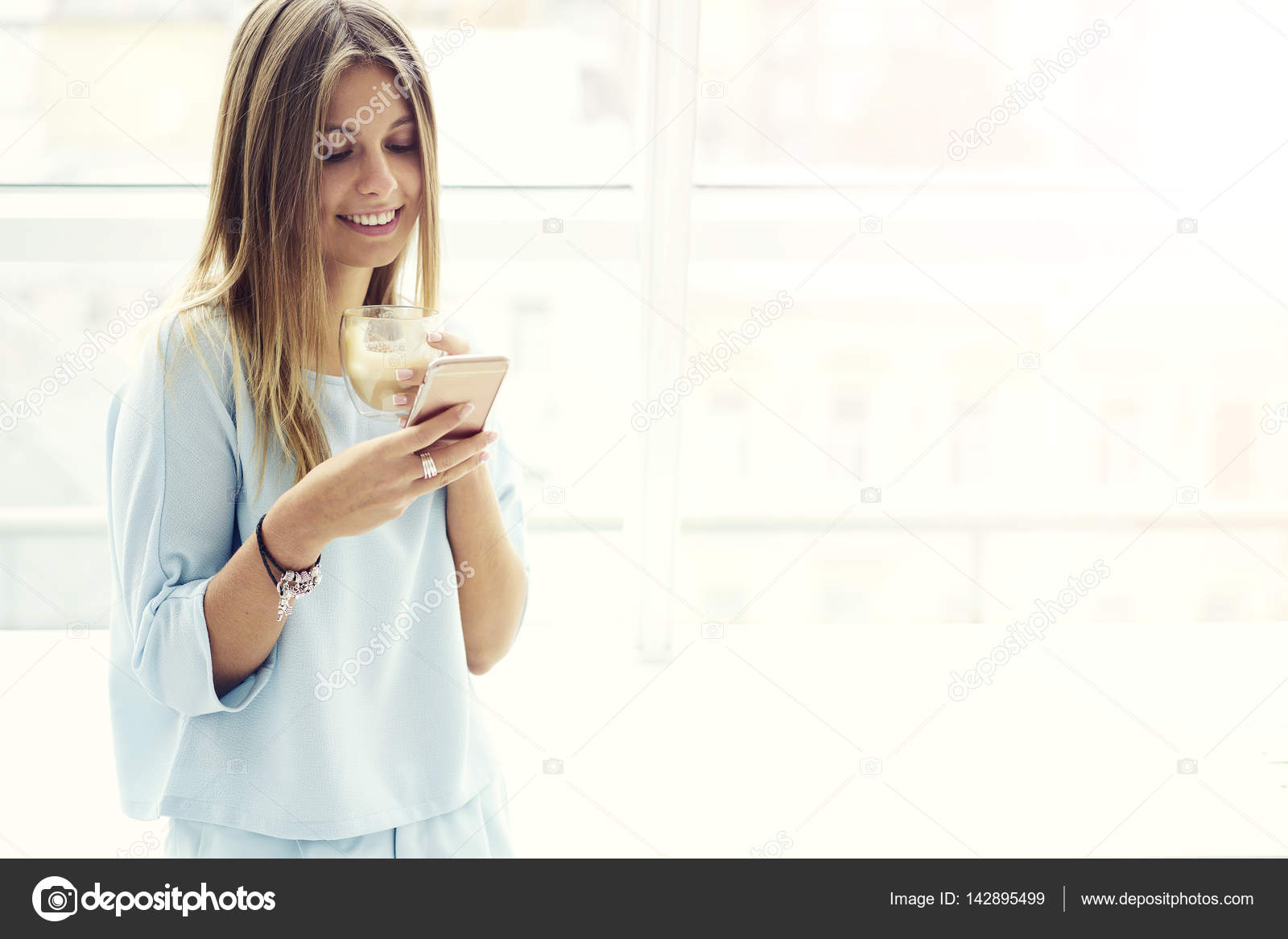 Independet young girl using wifi connection standing on copy space for ...