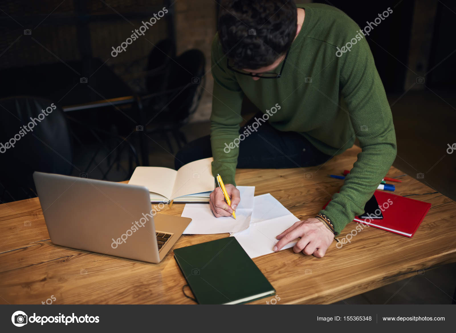 Talented male journalist working in studio Stock Photo by ©GaudiLab ...