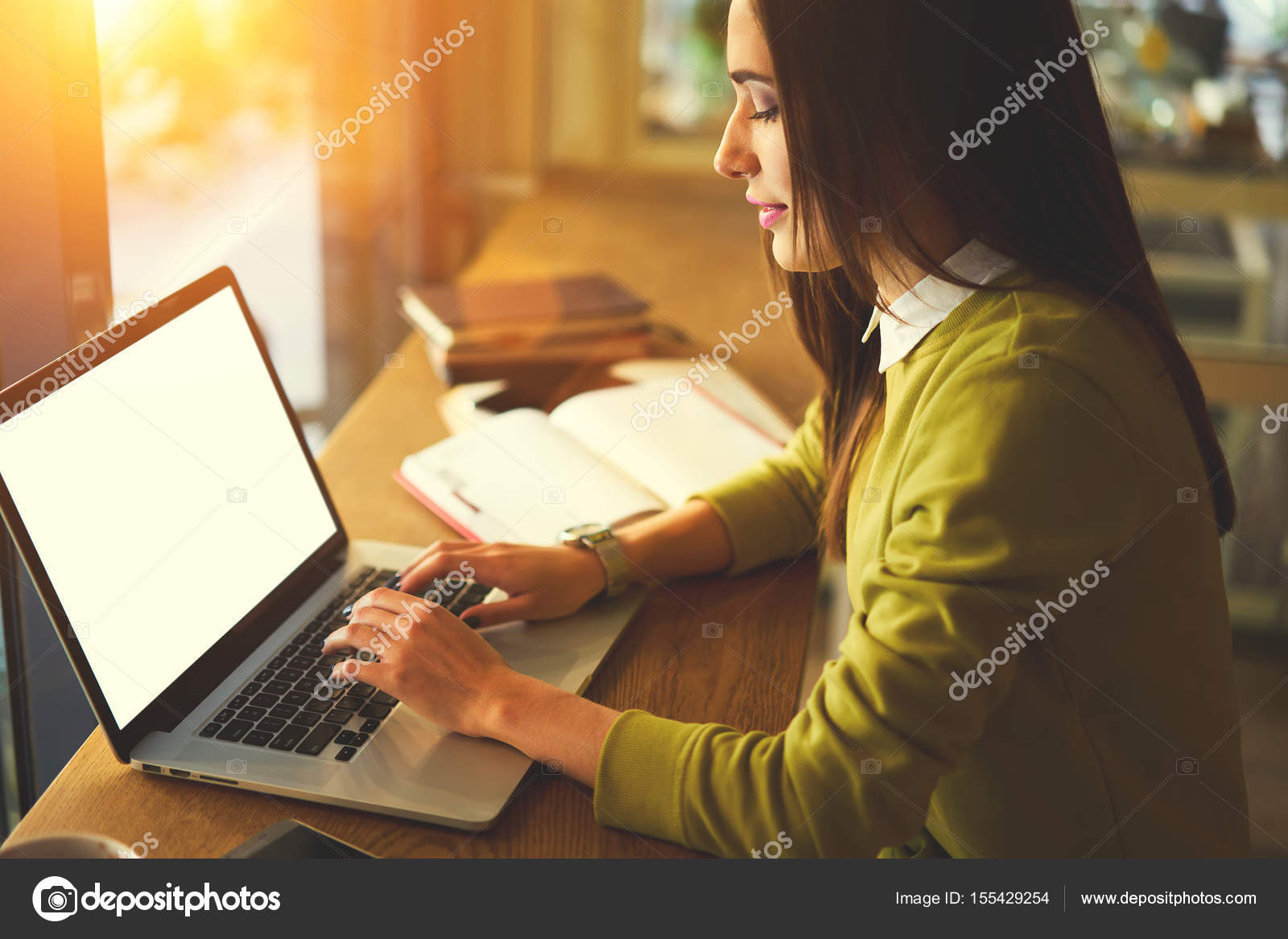 Attractive student working with laptop — Stock Photo © GaudiLab #155429254
