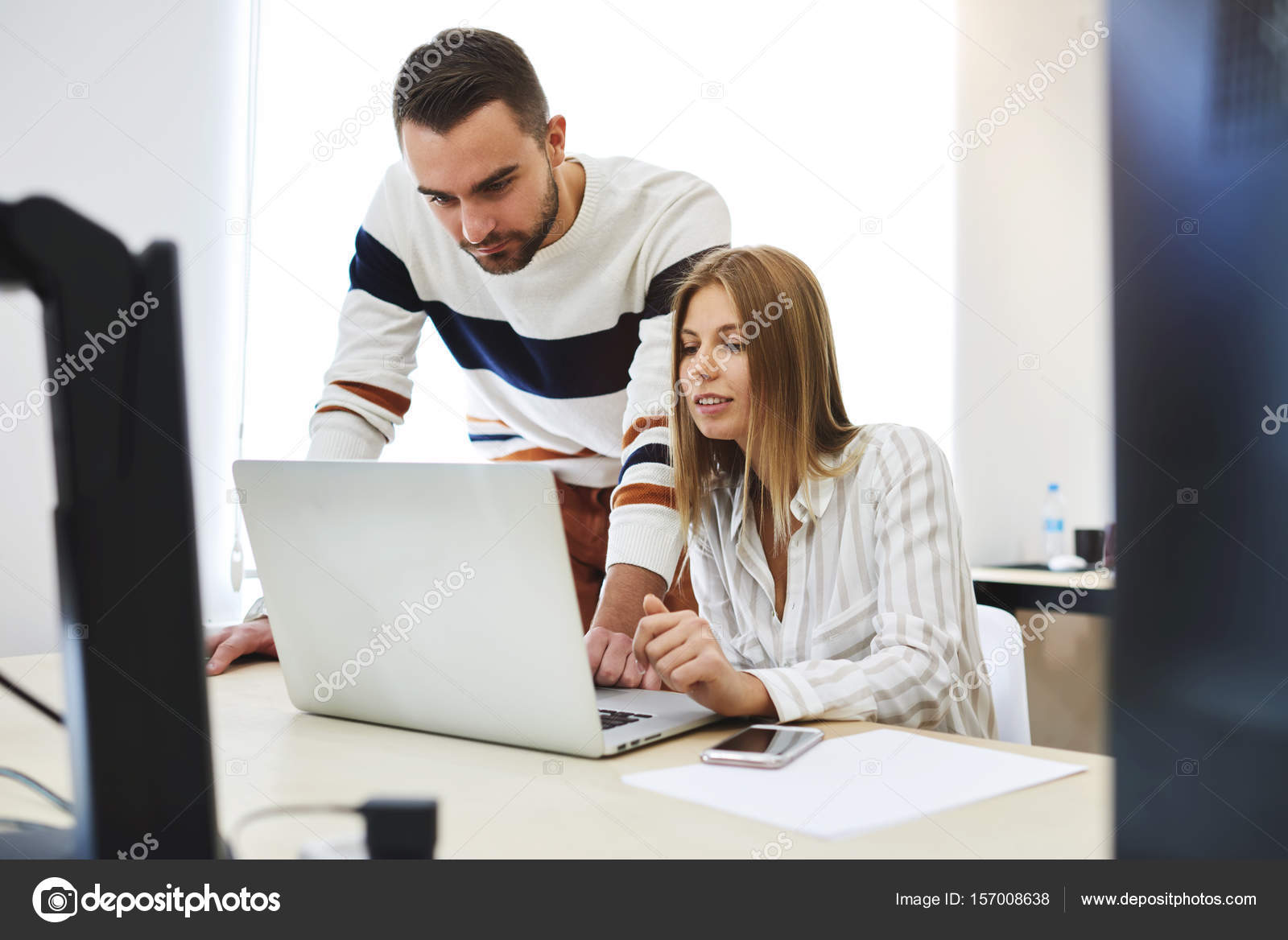 Freelancers using internet in office Stock Photo by ©GaudiLab 157008638