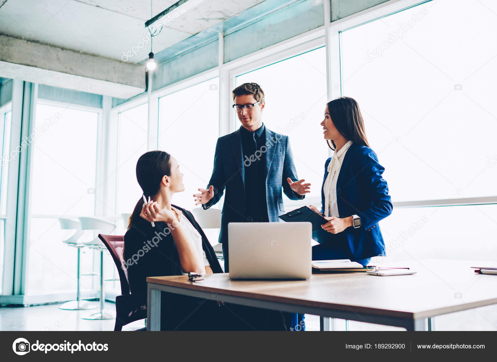 Professional Male Executive Manager Explaining Female Colleagues ...