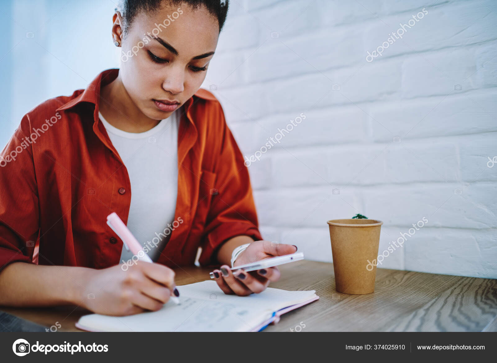 Serious Female Student Preparing University Examination While Writing ...