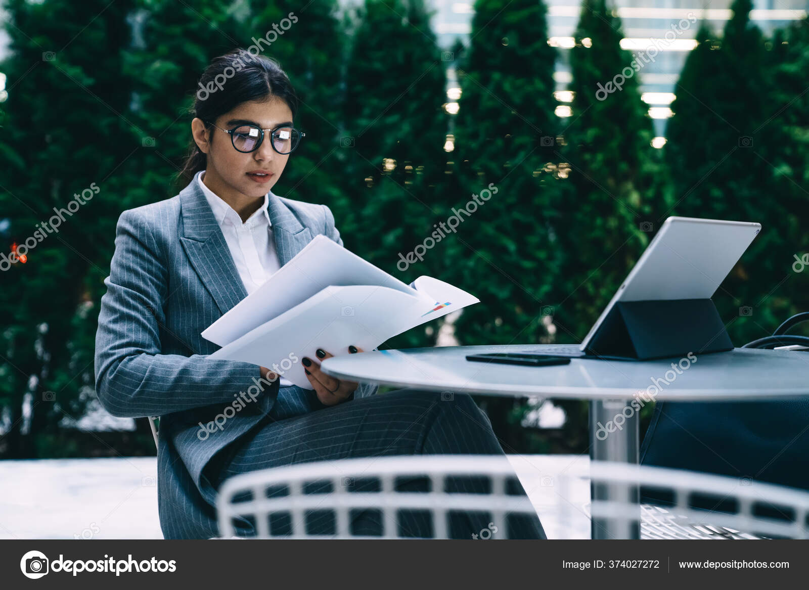 Professional Economist Using Paper Documents Portable Checking Monthly ...