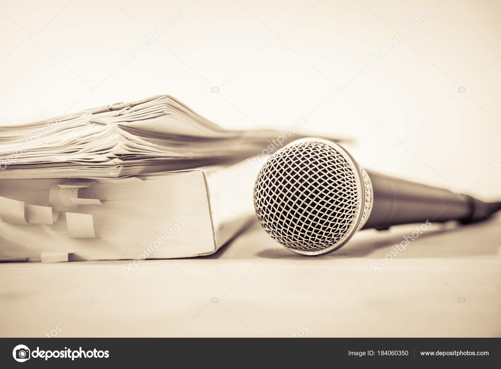 Close up a Microphone with paper document , concept of speaker o ...