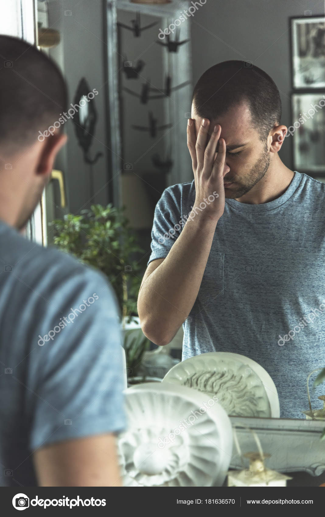 Sad Man Looking In The Mirror