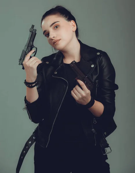 ⬇ Скачать картинки Gun And Leather Jacket стоковые фото Gun And