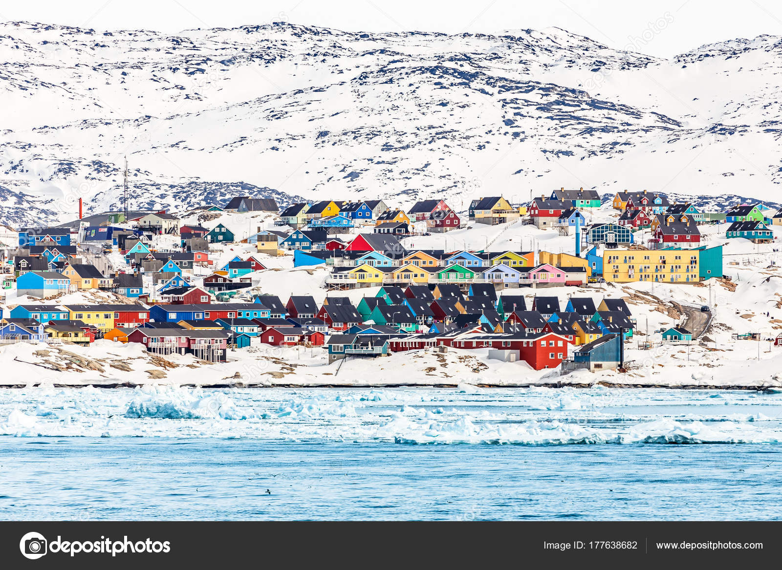 Arctic city panorama with colorful Inuit houses on the rocky hil Stock ...
