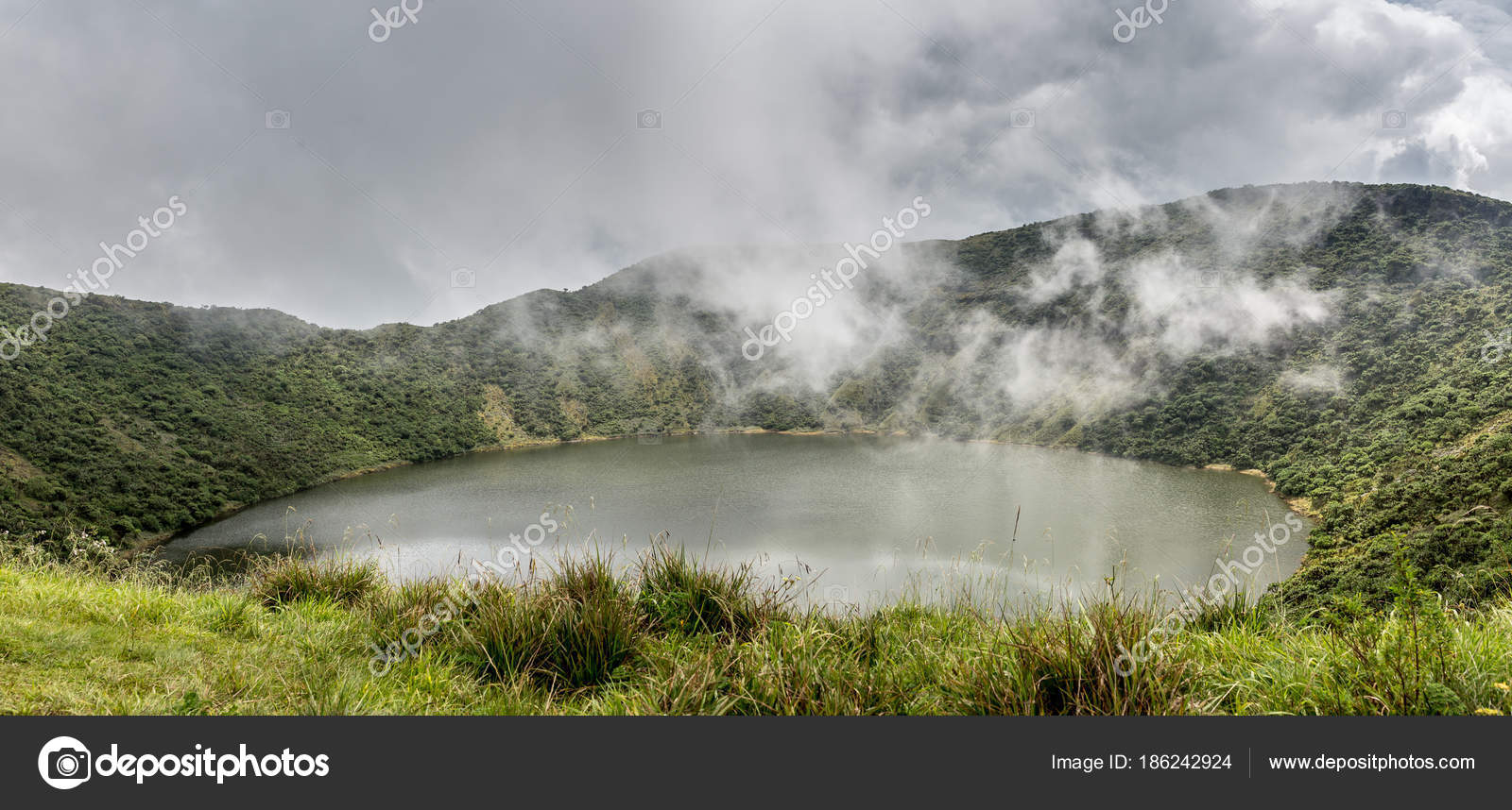 Lake inside Bisoke volcano crater, Virunga volcano national park ...