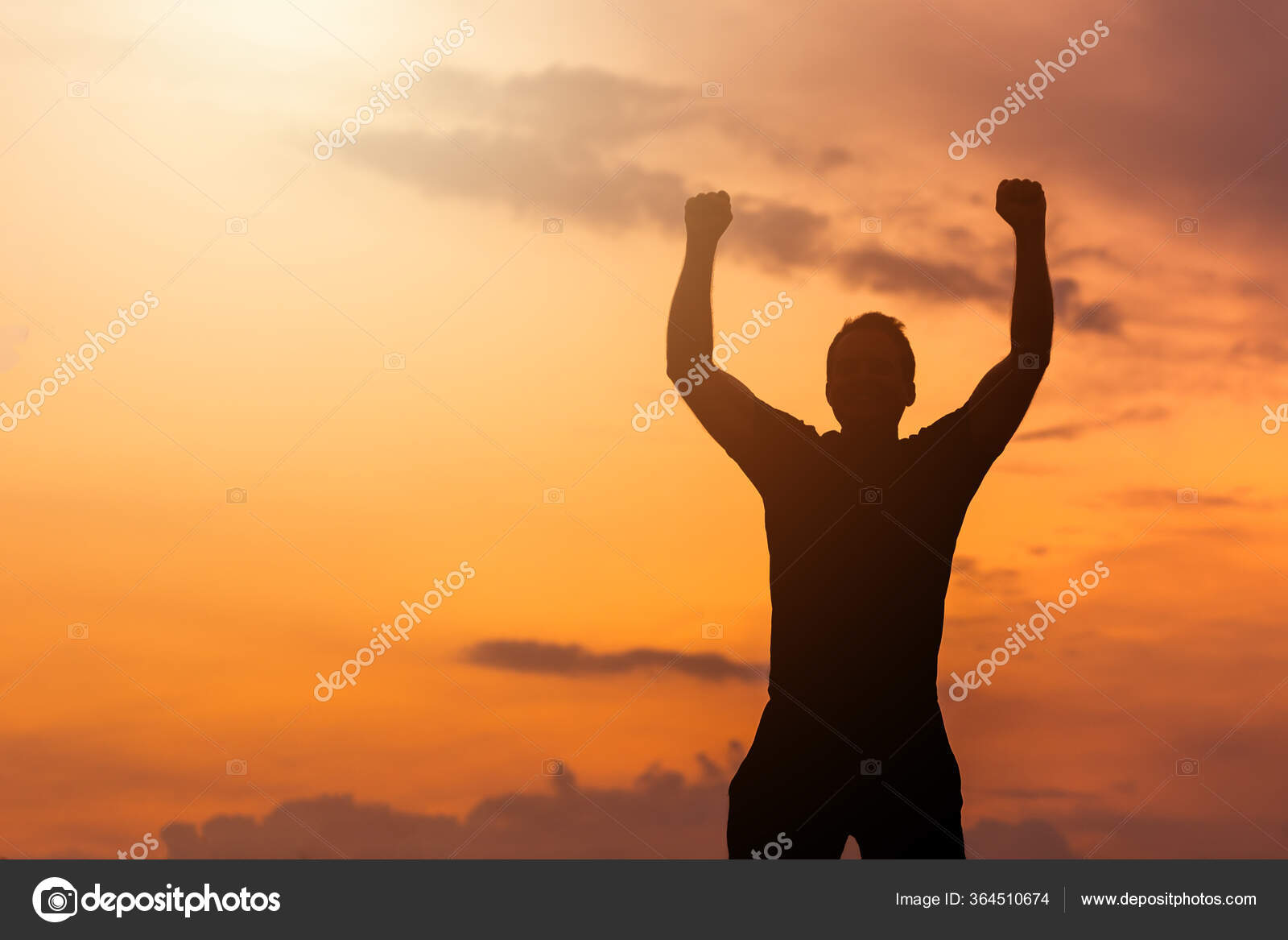 Silhouette Man Hands Raised Sunset Empowered Concept Stock Photo by ...