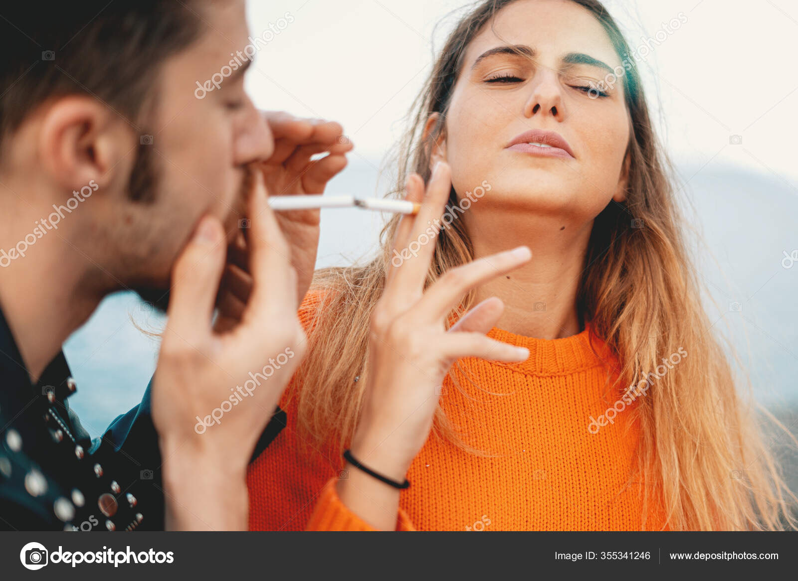 Young People Smoking Cigarettes