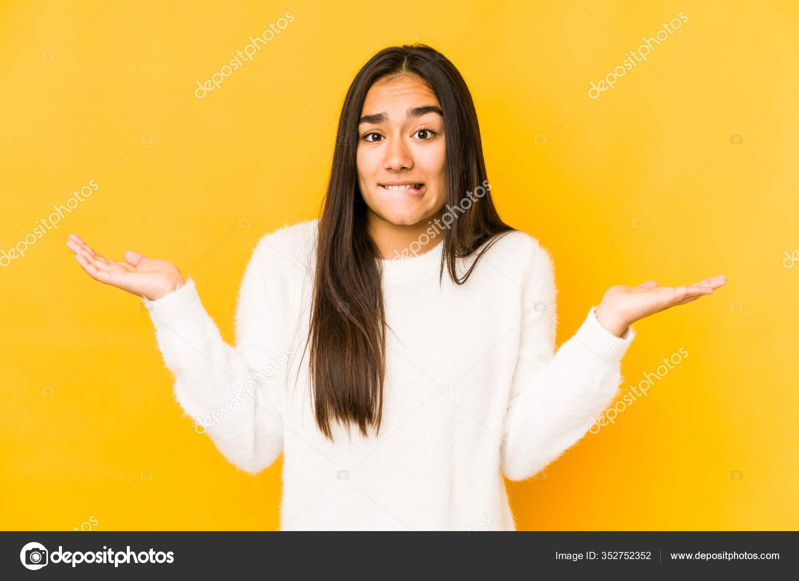 Young Woman Isolated Yellow Background Confused Doubtful Shrugging ...