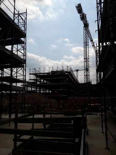 Work in progress on the construction site in the spring - resumption of ...