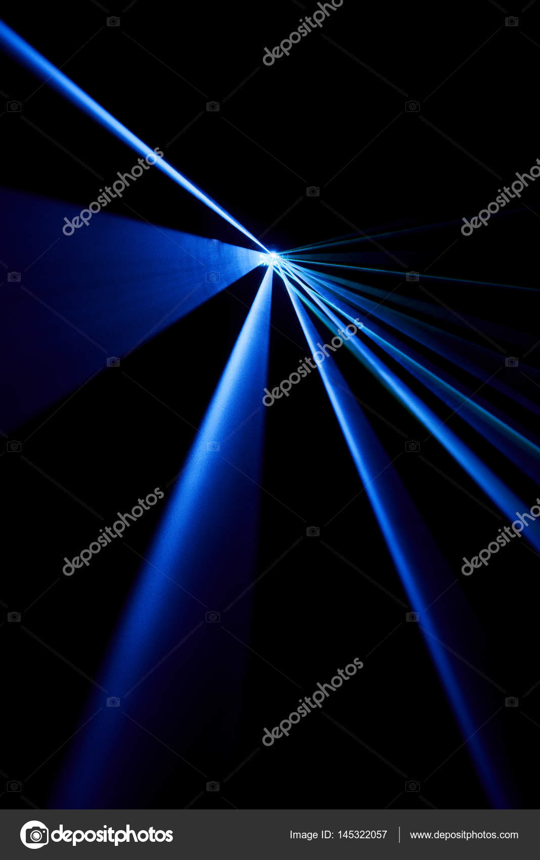 Laser beam blue on a black background Stock Photo by ©Sergmam 145322057