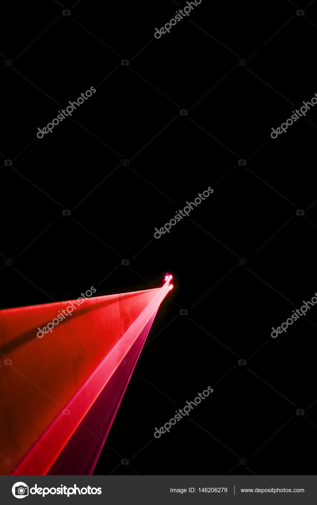 Laser beam red on a black background — Stock Photo © Sergmam #146206279