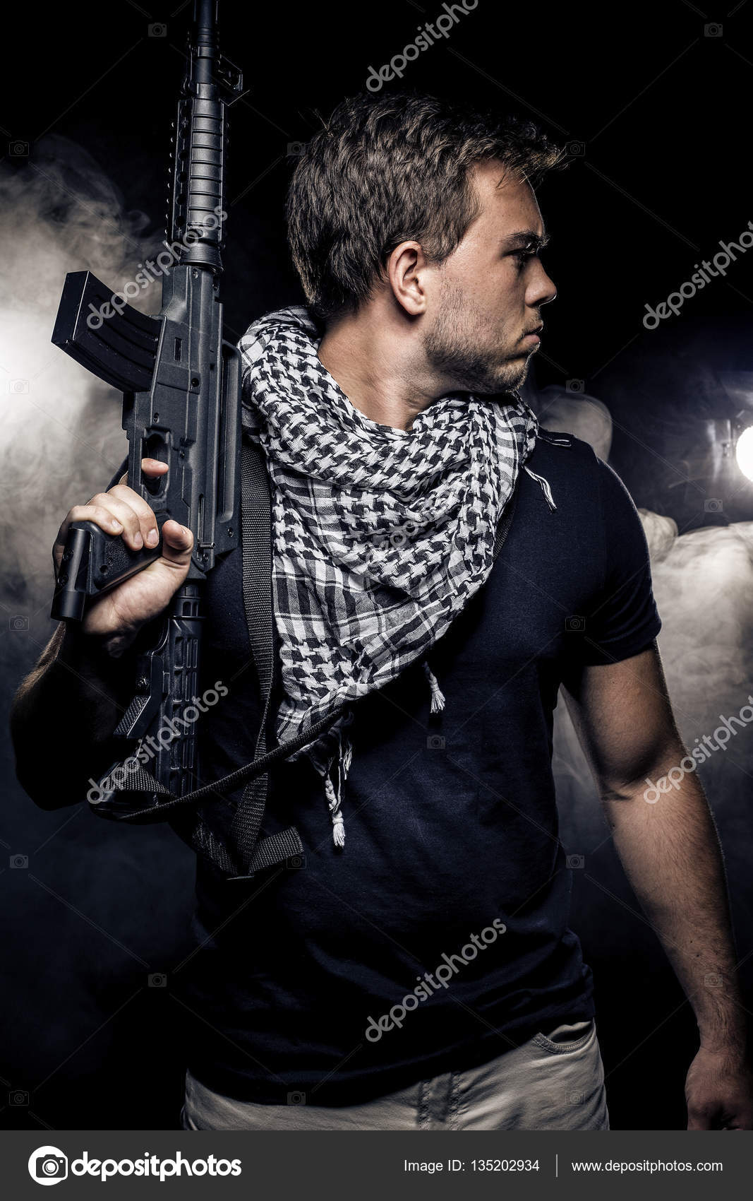 Soldier or mercenary with an assualt rifle or a prop such as paintball ...