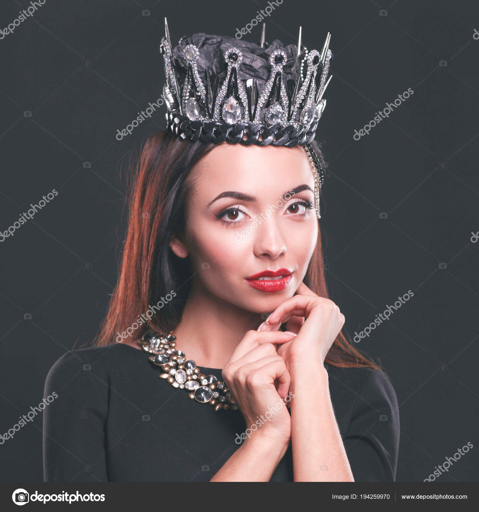 Beautiful girl in a crown ⬇ Stock Photo, Image by © lenetssergey #194259970