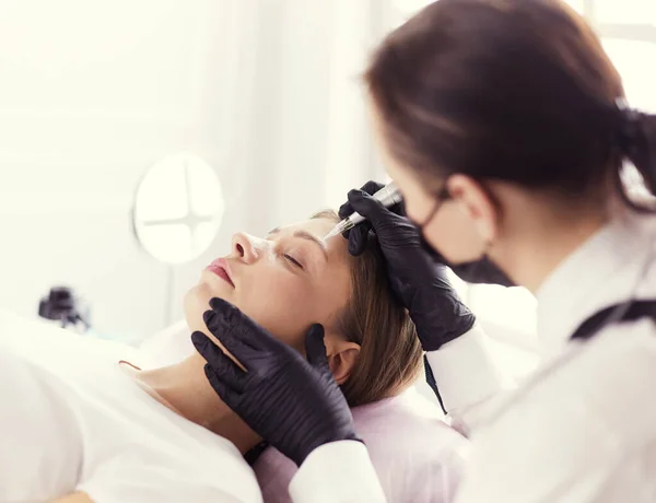 Microblading eyebrows work flow in a beauty salon. Stock Photo by ...