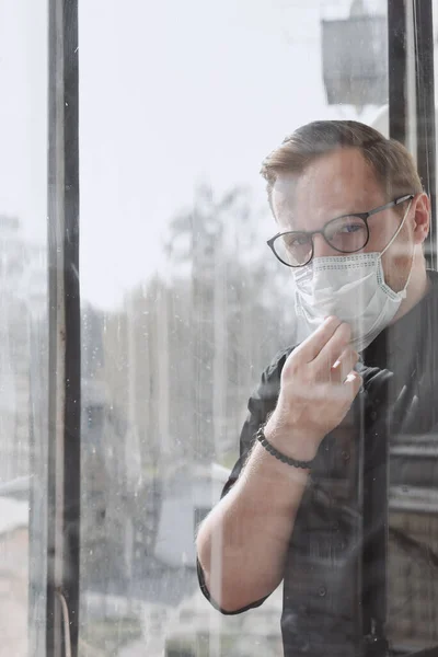 covid-19, the men in isolation near the window, coronavirus - Stock ...