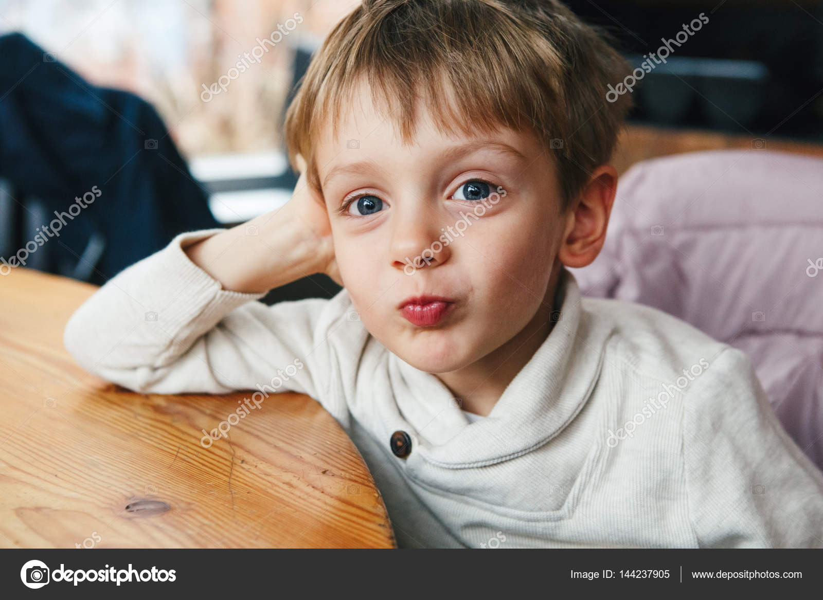 Boy making faces Stock Photo by ©AnoushkaToronto 144237905