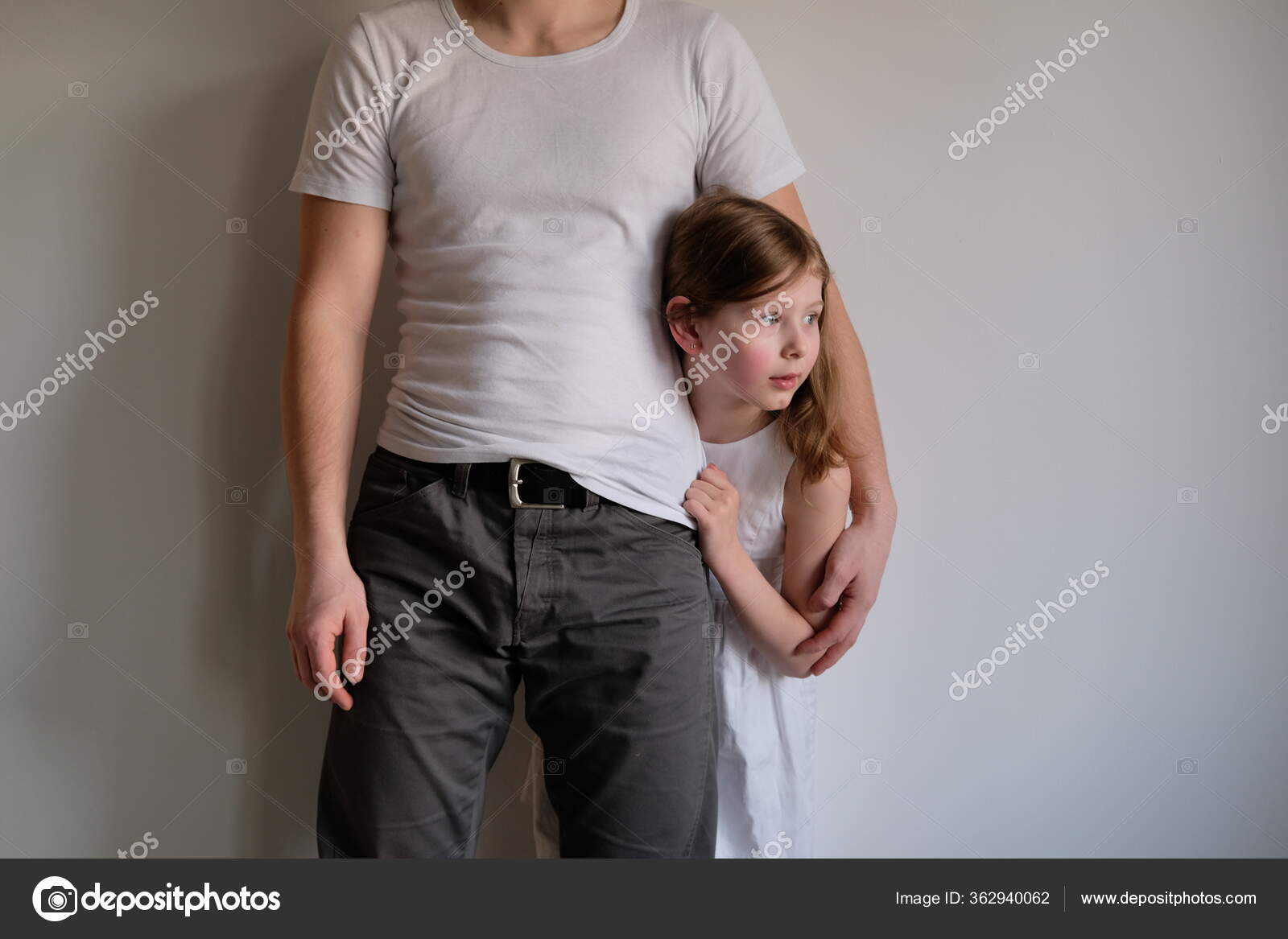 Scared Little Girl Hiding Her Dad Daughter Seeks Protection Man Stock ...