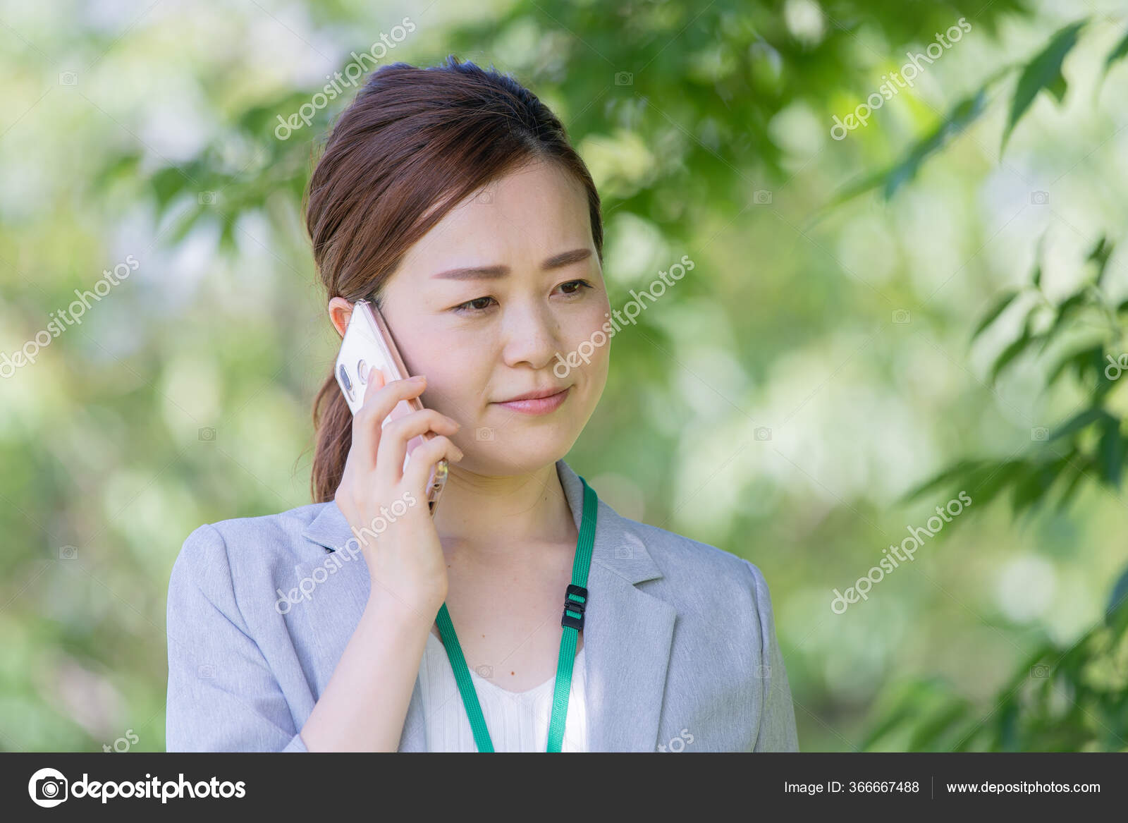 Asian Female Business Person Calling Smartphone Troubled Expression ...