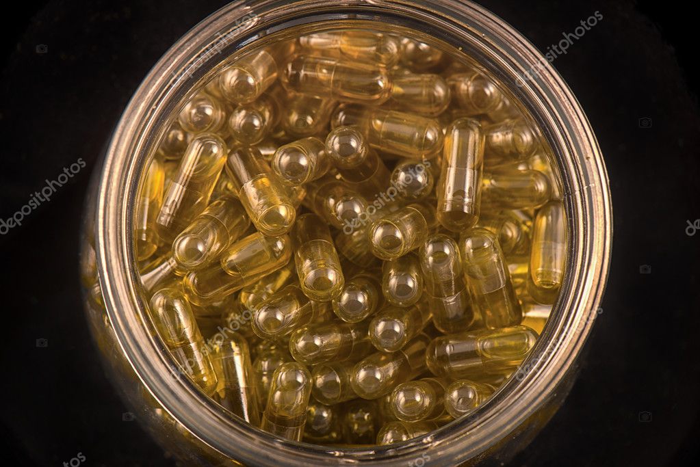 Cannabis extraction capsules infused with shatter Stock Photo by ...