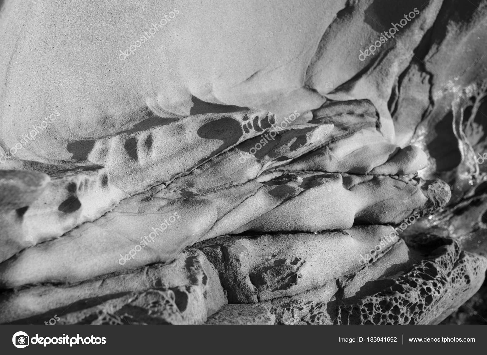 Black and white rock formation by the ocean in Jack Point Park Stock ...