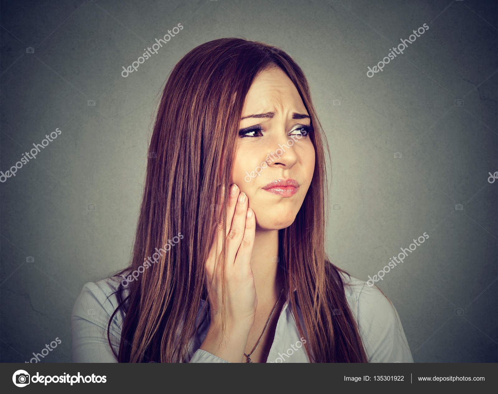 Woman with sensitive toothache about to cry from pain Stock Photo by ...