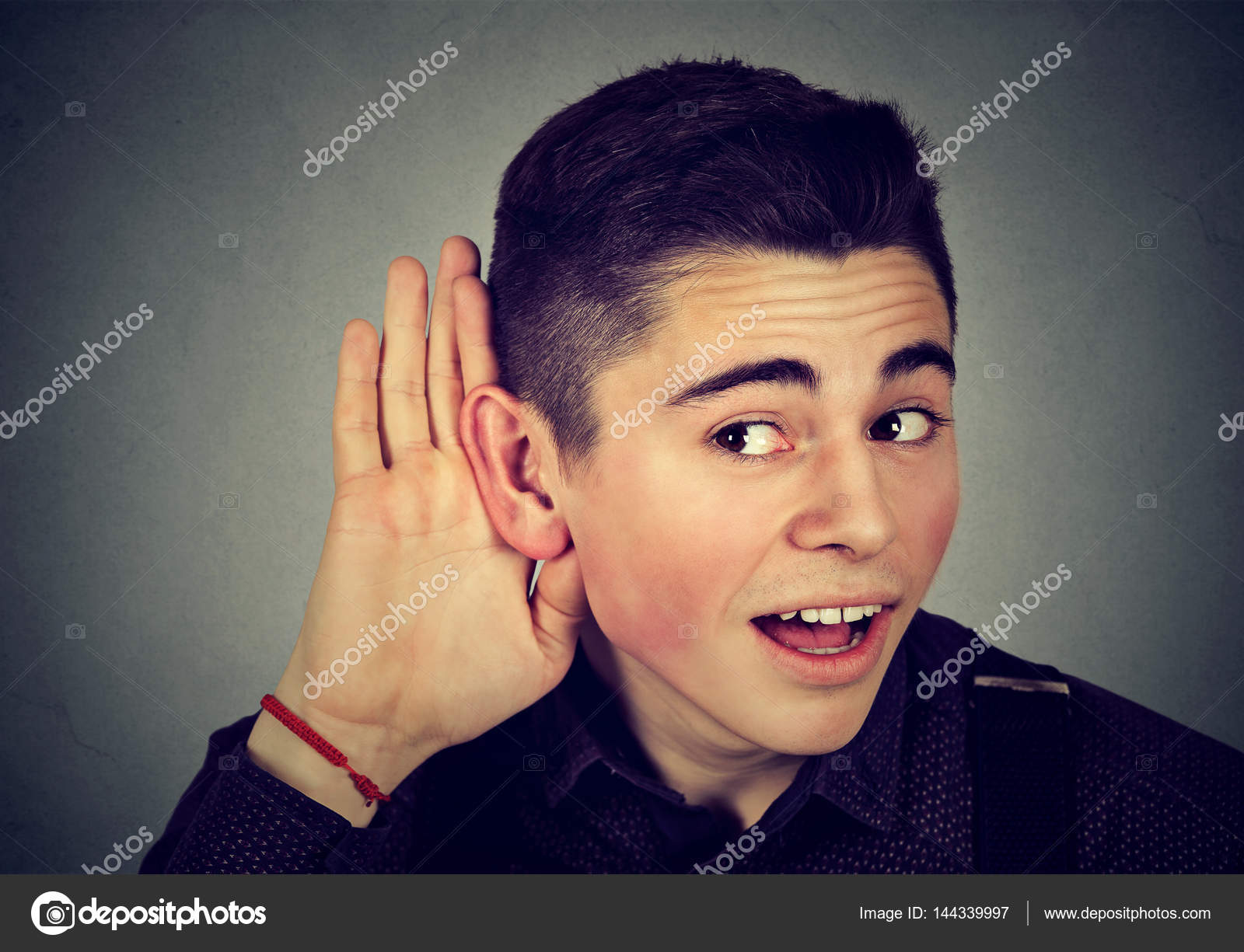 Curious nosy man with hand to ear listening to gossip conversation ...