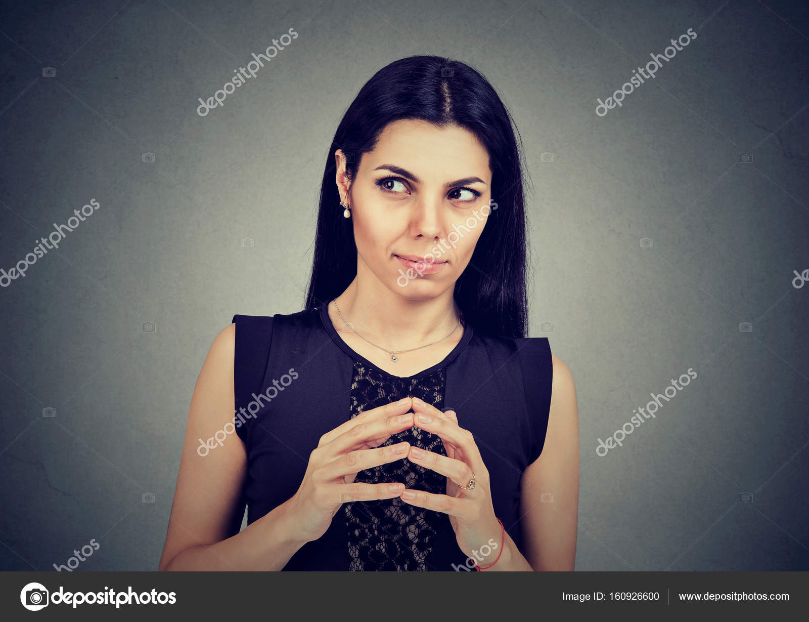 Sly, scheming woman plotting something — Stock Photo © SIphotography ...
