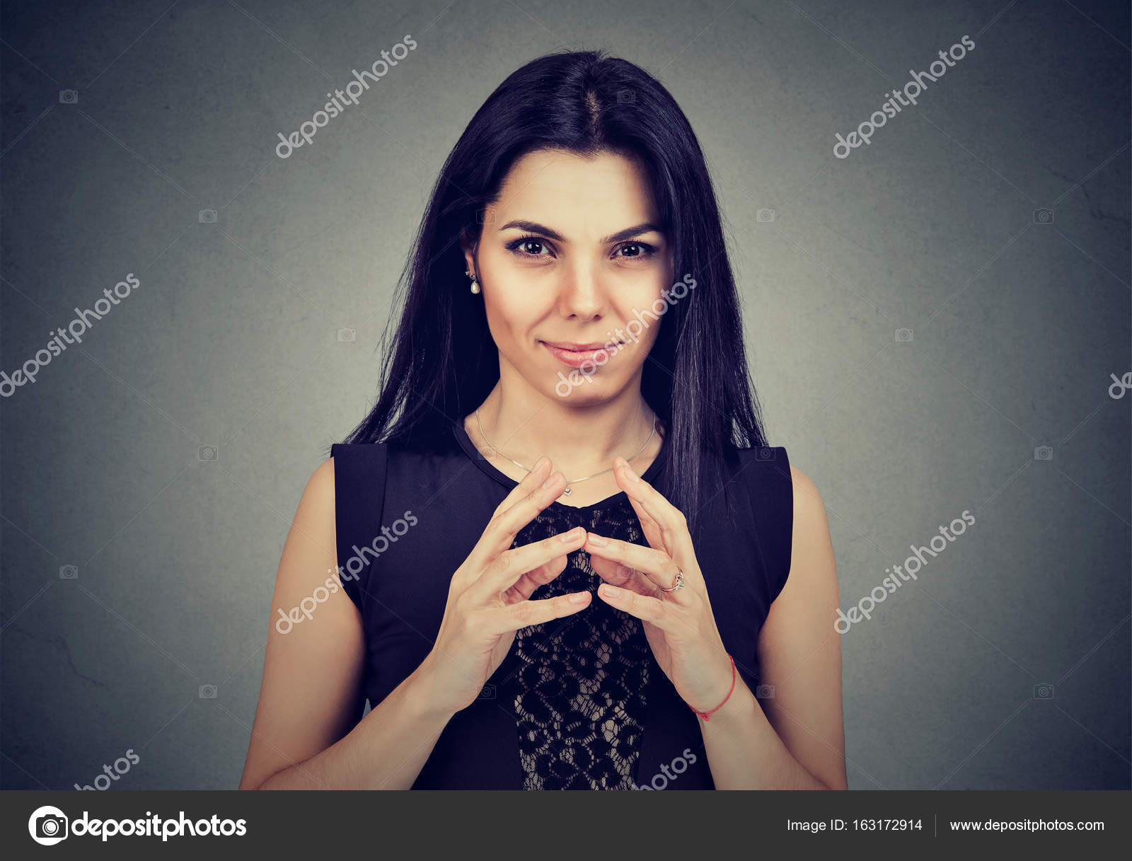 Sly, scheming woman plotting something Stock Photo by ©SIphotography ...
