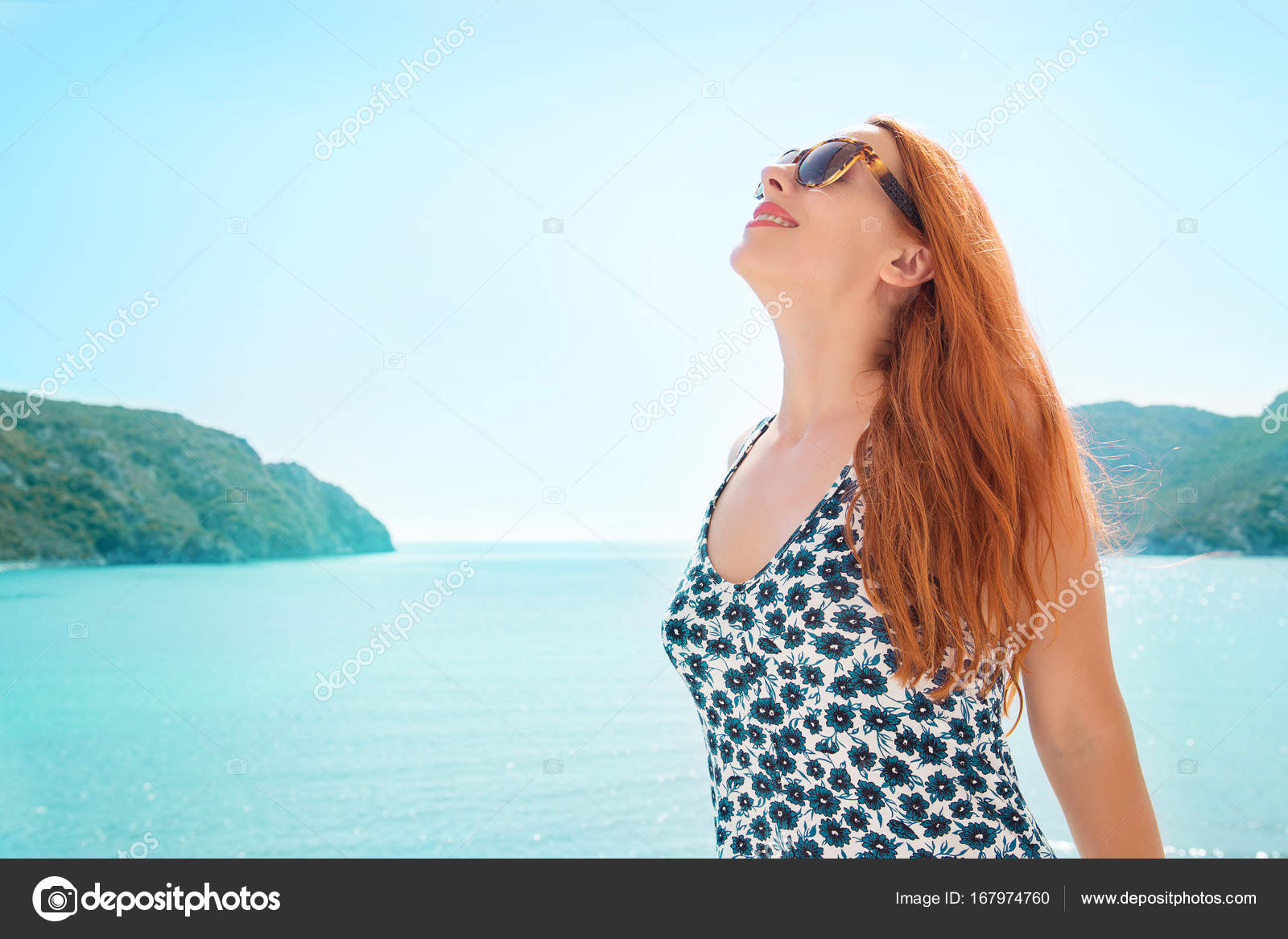 Woman smiling taking deep breath enjoying freedom and good weather by ...