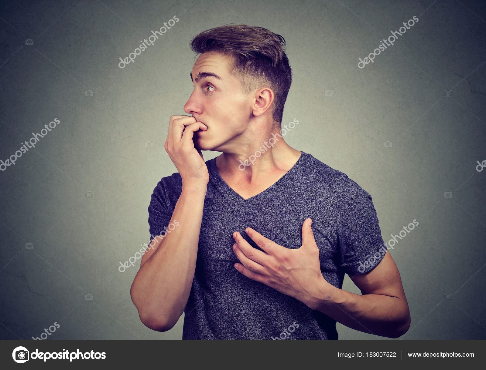 Scared man posing in panic Stock Photo by ©SIphotography 183007522