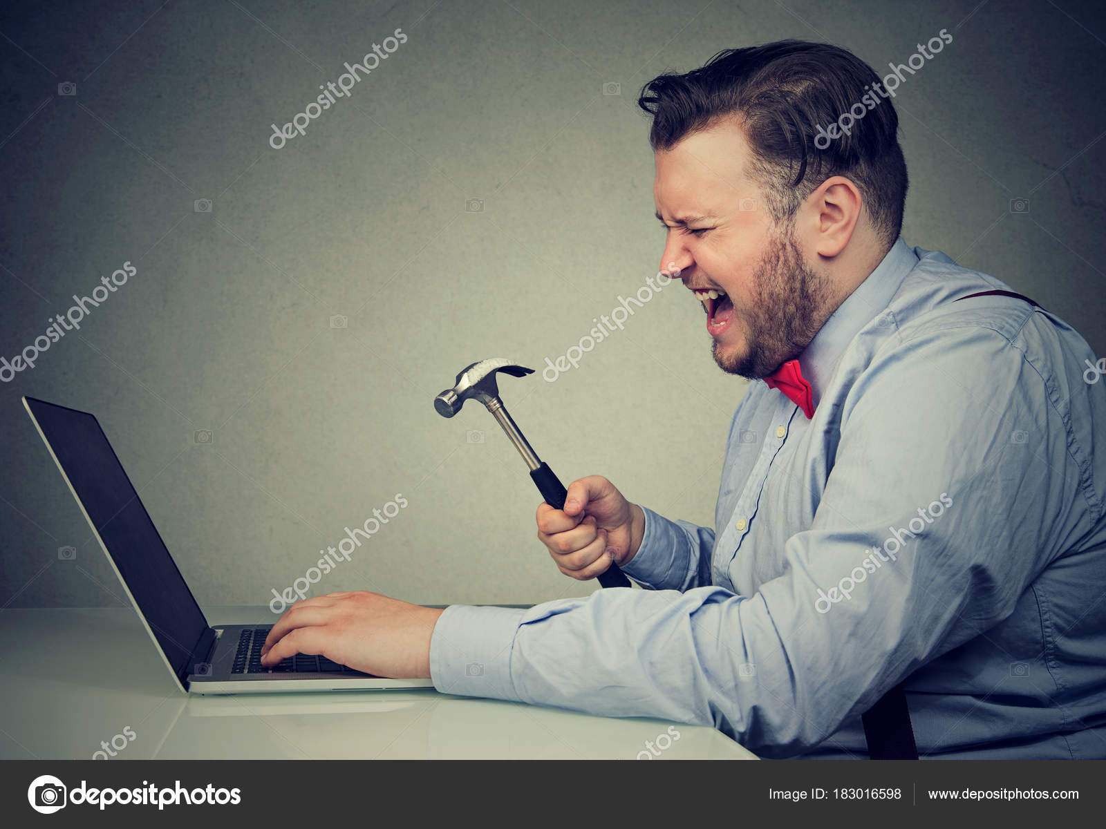 Angry man with hammer and broken laptop Stock Photo by ©SIphotography ...
