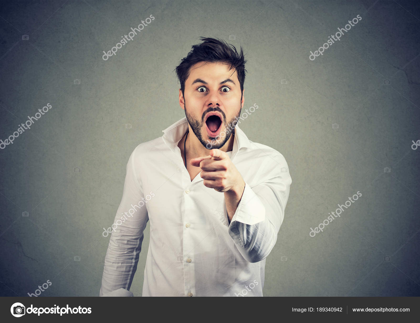 Amazed man pointing at camera in blame Stock Photo by ©SIphotography ...