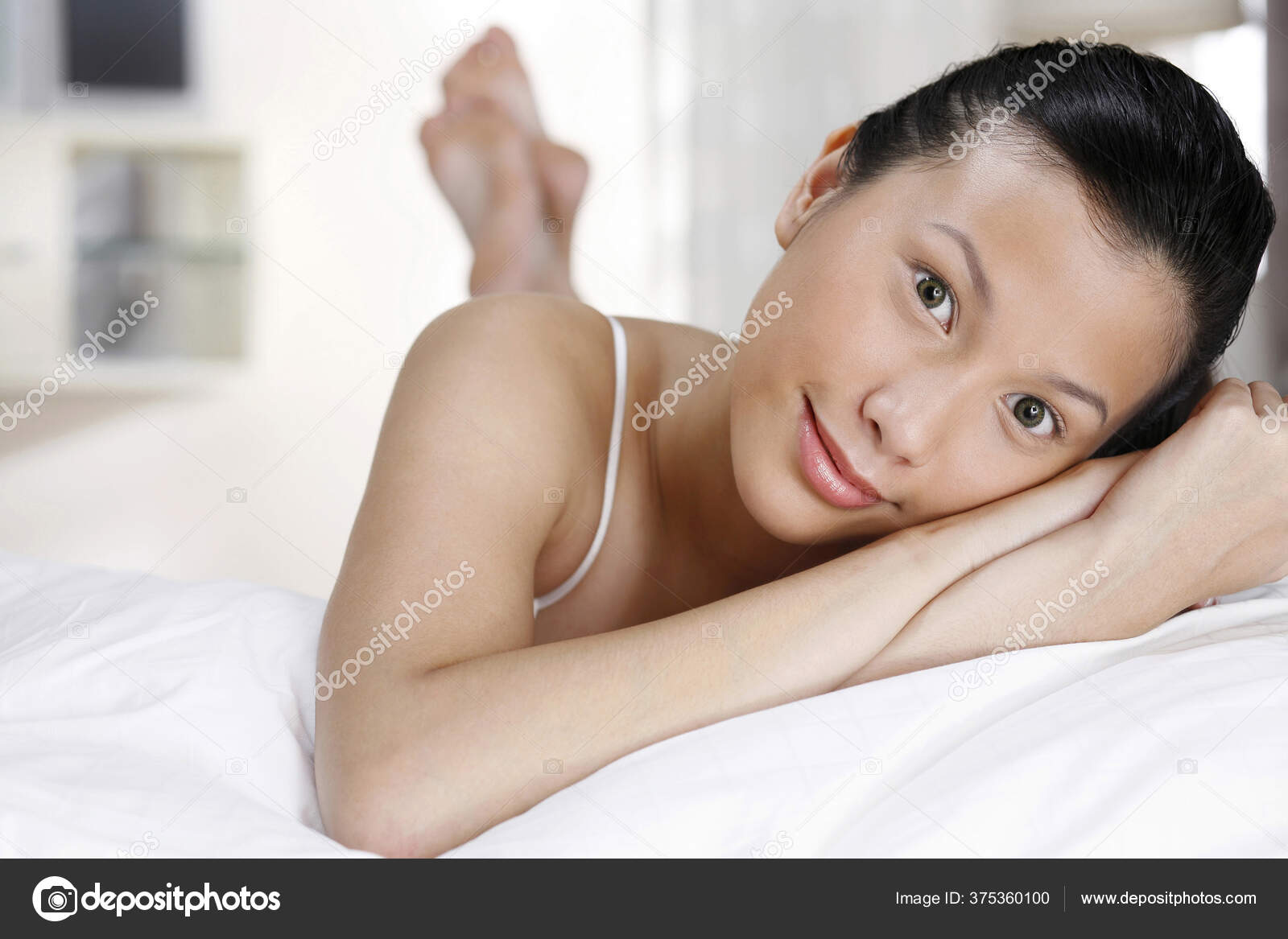 Woman Lying Forward Bed Smiling Camera — Stock Photo © image_hit #375360100