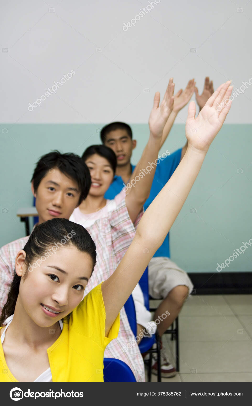 College Student Raising Hand