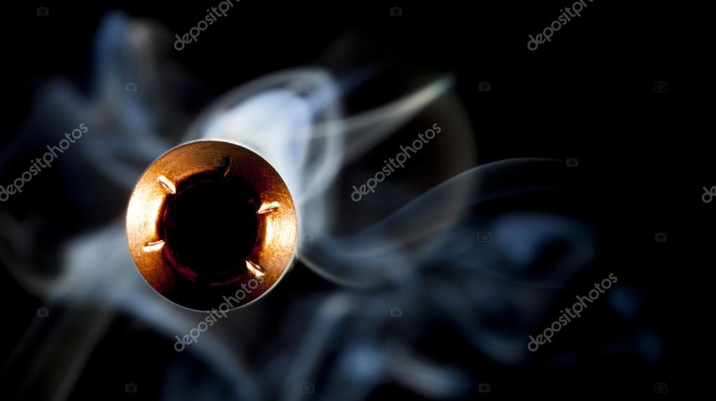 Airborne bullet and smoke Stock Photo by ©gsagi 125494590