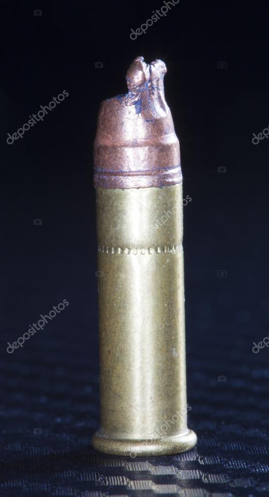 Scarred rimfire bullet — Stock Photo © gsagi #126160288