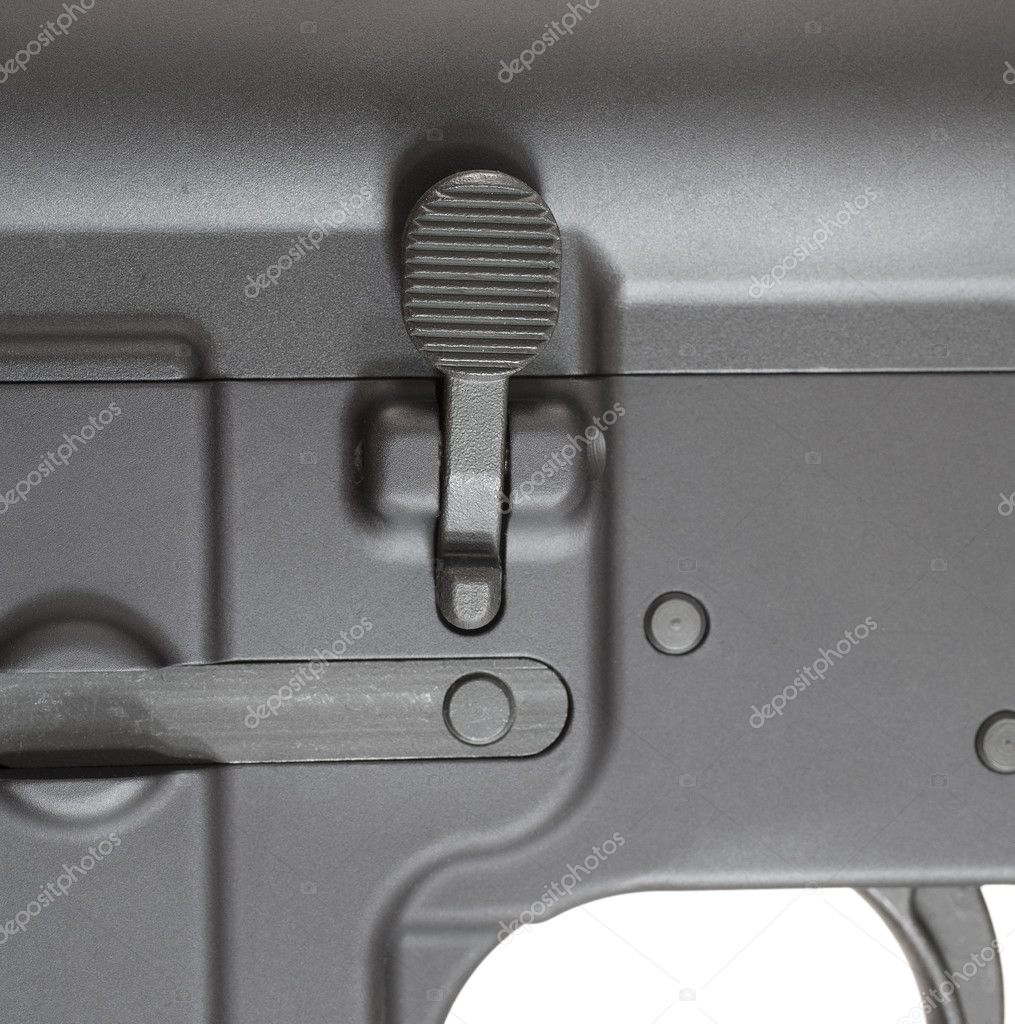 Magazine release button on an AR-15 — Stock Photo © gsagi #128447658