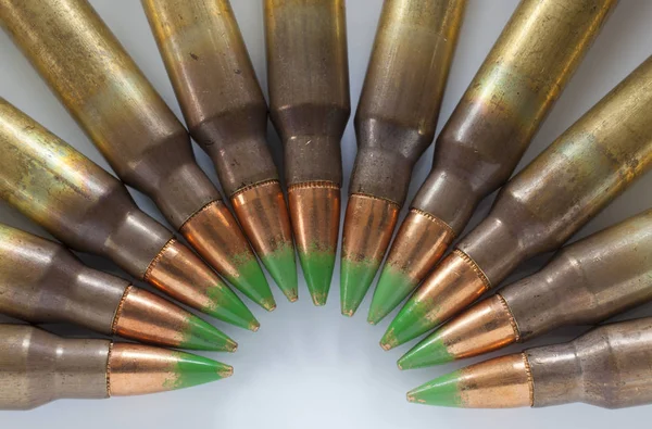 Semi circle of bullets with green tips - Stock Image - Everypixel