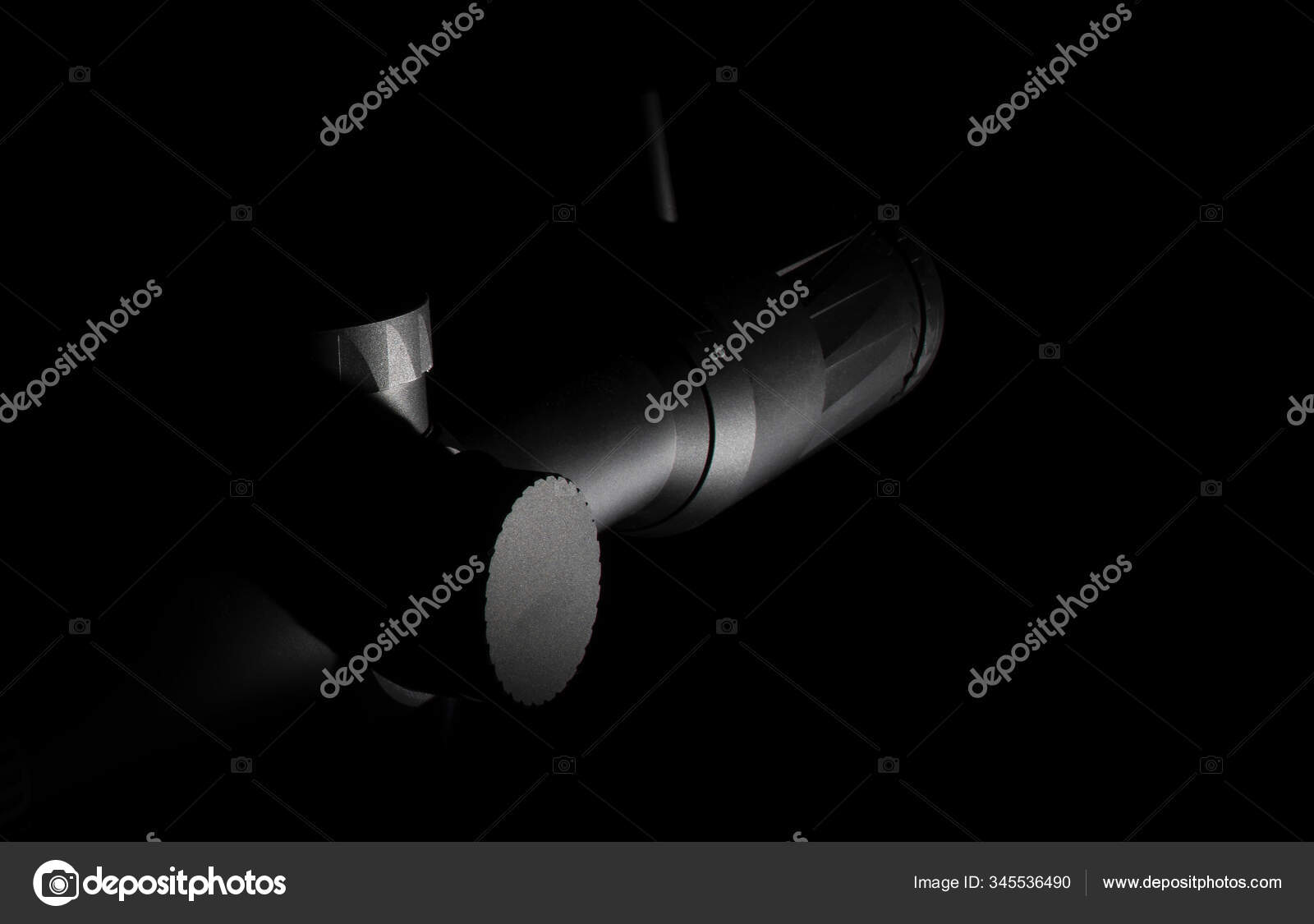 Mysterious rifle scope on a dark background Stock Photo by ©gsagi 345536490