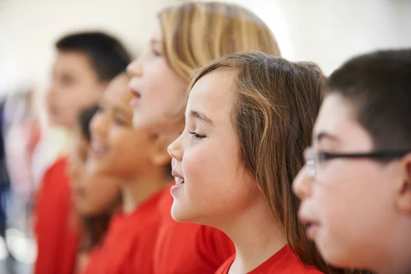 Group Of School Children Singing In Choir Together Stock Photo by ...