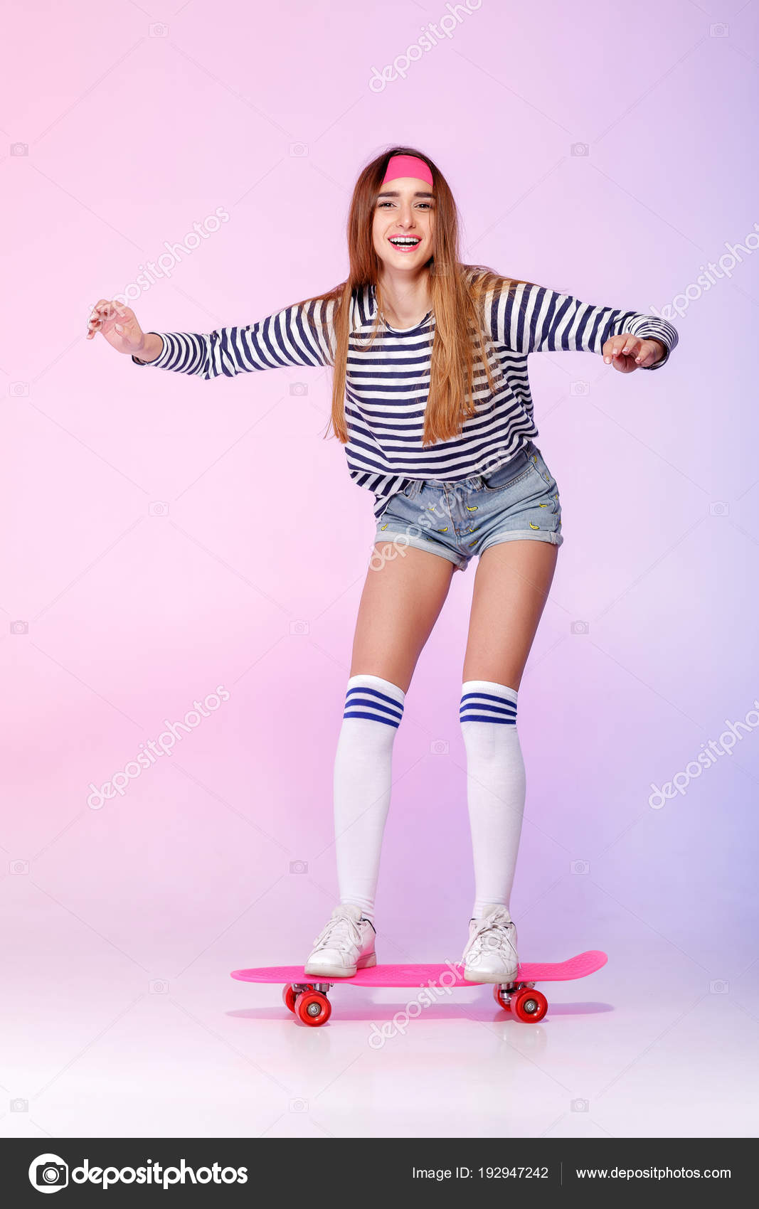 Beautiful woman with skate in studio Stock Photo by ©erstudio 192947242