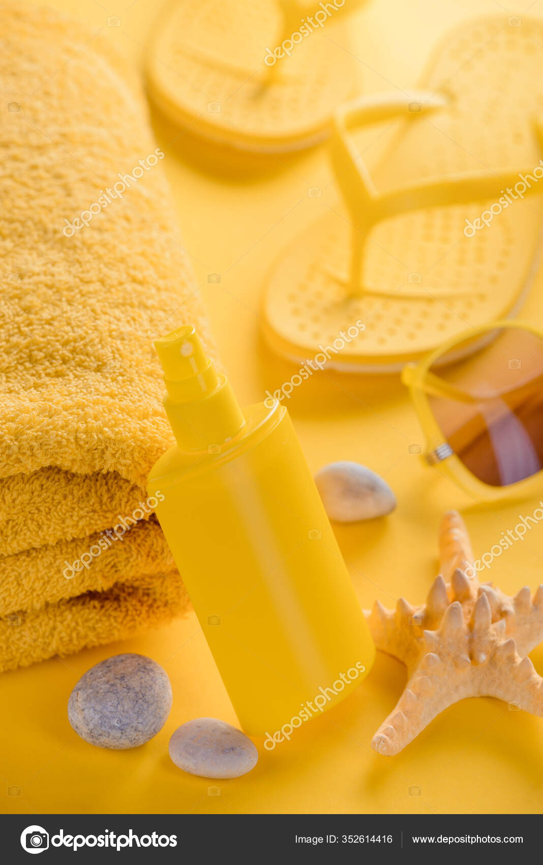 Yellow sunscreen spray advertisement Stock Photo by ©YGphoto 352614416