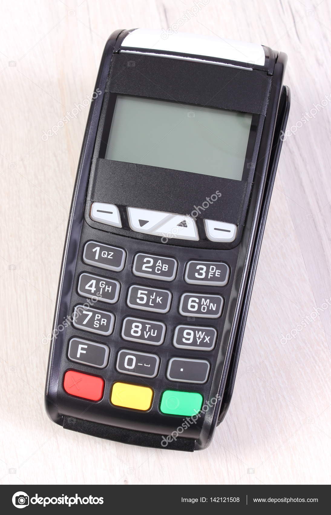 Payment terminal, credit card reader on wooden background, cashless ...