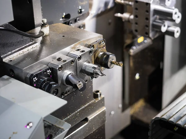 machining automotive part by cnc turning machine - Stock Image - Everypixel