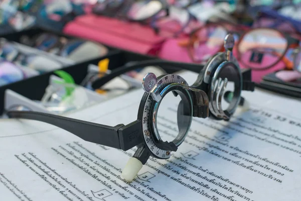 Glass optometry test and many types of glasses at glasses shop - Stock ...